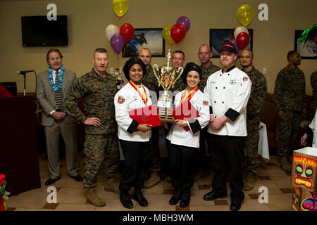 Brig. Gen. Julian Alford, left, Janet Taylor, center, and her husband ...