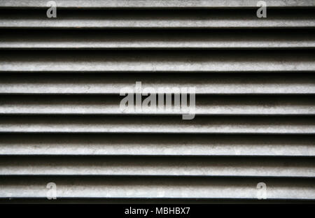 Drain grates with light background texture Stock Photo - Alamy