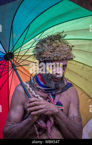 Colorful Huli Wigmen of Papua New Guinea with Laptop Computer and Cell ...