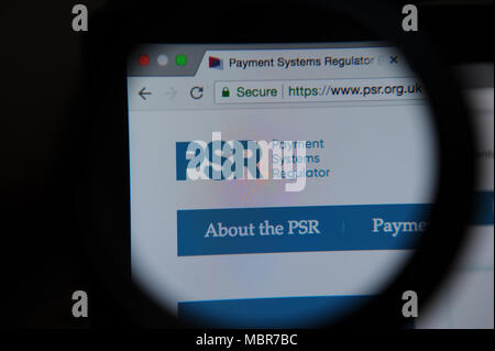 Payment Systems Regulator (PSR) seen through a magnifiying glass on a ...