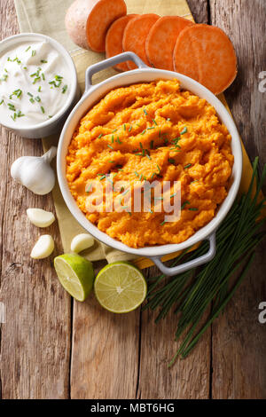 A Bowl of Creamy Mashed Potatoes with Chives on Top Isolated on a White ...