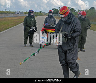 Members of the Miami-Dade Fire Department Fire and Rescue team, respond ...
