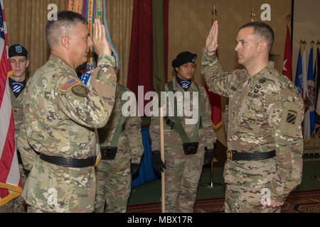 Brig. Gen. Sean Bernabe, Task Force Marne commander, pins an Army ...