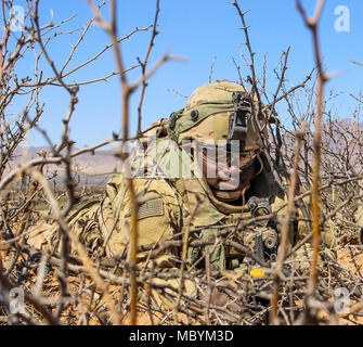 2d Battalion, 198th Armored Regiment Soldiers inspect the MILES system ...