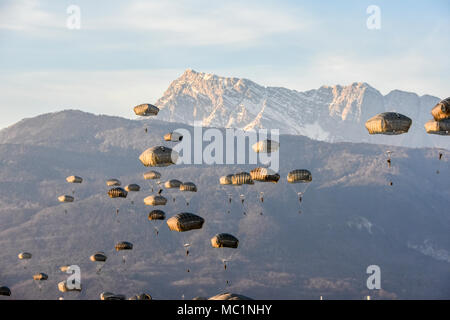 The skies of northern Italy are filled with paratroopers from the 173rd ...