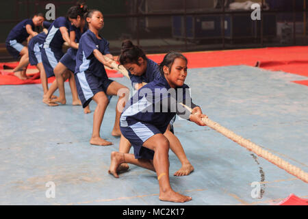 Guwahati, India. 12th Apr, 2018. Players in action in Traditional game ...