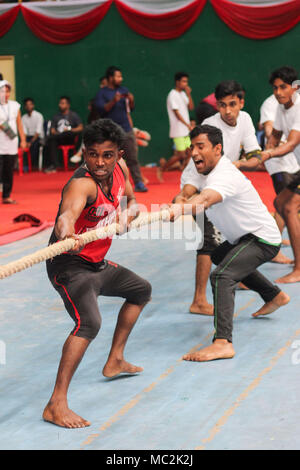 Guwahati, India. 12th Apr, 2018. Players in action in Traditional game ...