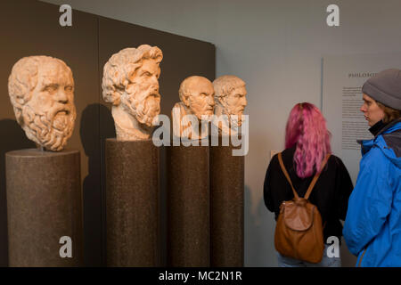 Visitors admire the sculpture of the ancient Greek Parthenon's Elgin ...