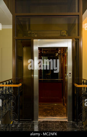 Open elevator lift shaft. Modern architecture with transparent ceiling ...