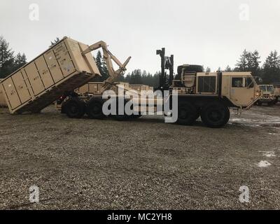 An M1075 palletized load system truck assigned to 15th Transportation ...