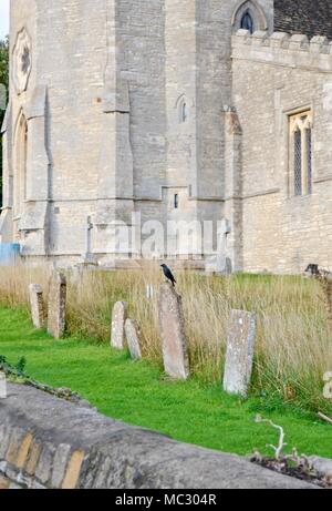 Graveyard at the Church of Saint Laurence in Stanwick, Northamptonshire ...