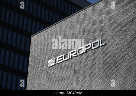A logo of Europol is displayed on the Europol headquarters building in ...