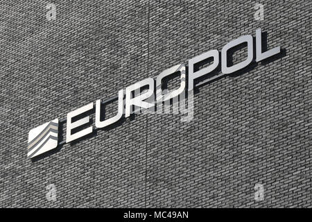 A logo of Europol is displayed on the Europol headquarters building in ...
