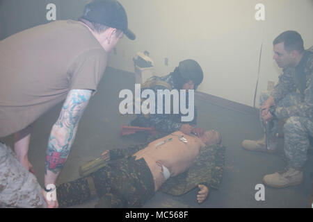 PORTSMOUTH, Va. (Jan. 12, 2018) Hospital Corpsman 2nd Class (FMF) Aaron ...