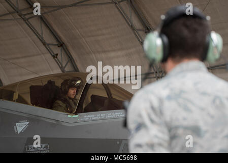 A Pilot Of The 33Rd Fighter Squadron, Sits In The Cockpit Of His ...
