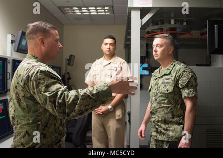 Capt. Jeffrey James, left, commander of Joint Base Pearl Stock Photo ...