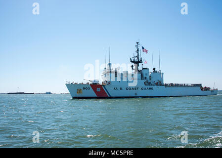 The crew of the Coast Guard Cutter Harriet Lane sails past Fort Sumter ...