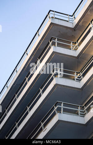 1960s Brutalist multi storey car park with concrete walkway and ramp at ...