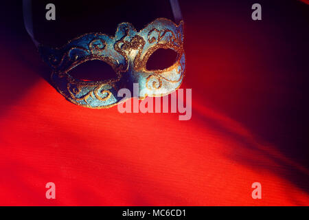 Image of elegant blue and gold venetian mask over red background Stock ...