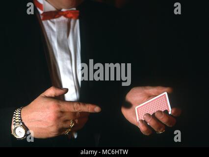 Stage Magic - Card Tricks Magician fanning decks of cards for the ...