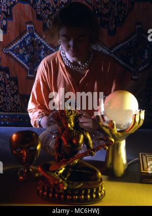 Lady Reading a Crystal Ball Stock Photo - Alamy