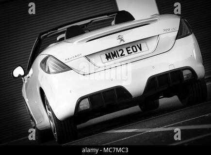 Rear view of a white Peugeot 308cc Roland Garros convertible sports car ...