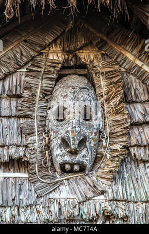 Haus Tambaran (men's or spirits house) decorated with a wood carved ...