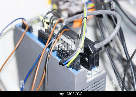 PLC programmable logic controller input/output modules installed in a ...