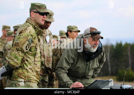 U.S. Army Lt. Col. Jesse Moskowitz, left, a general surgeon with the ...