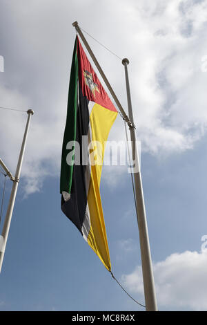 The flag of Mozambique flies with other flags from countries of the ...