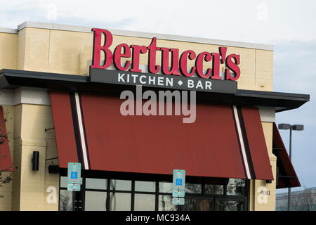 A logo sign outside of a Bertucci's restaurant location in Columbia ...