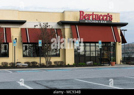 A logo sign outside of a Bertucci's restaurant location in Columbia ...