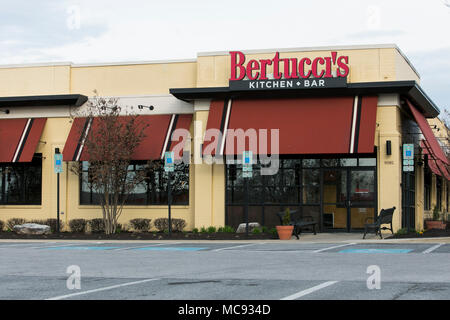 A logo sign outside of a Bertucci's restaurant location in Columbia ...