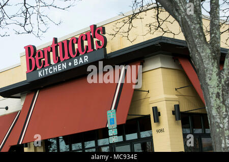 A logo sign outside of a Bertucci's restaurant location in Columbia ...