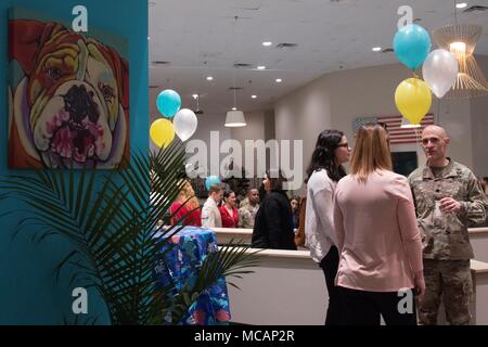 Rocky the Bulldog, 3rd Infantry Division mascot, fist bumps a student ...