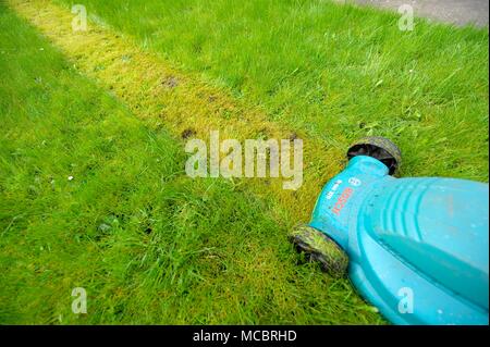 First lawn cut of the year Stock Photo - Alamy