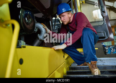 industrial mechanic repairing heavy industry machine in plant Stock ...
