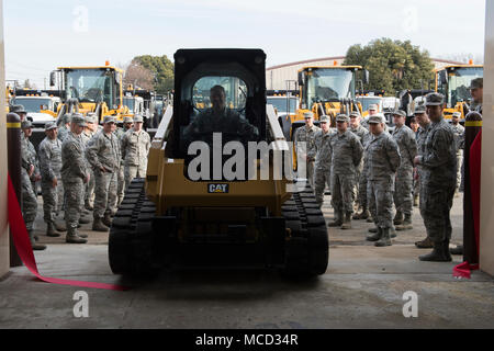 Col. John Winkler, 374th Mission Support Group commander, receives ...