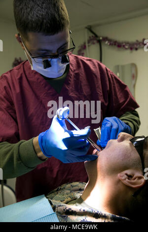 Lt. Nick Crossland, the 31st Marine Expeditionary Unit’s dental officer ...