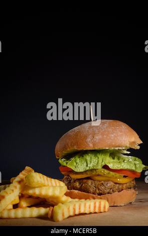 Appetizing succulent fresh hamburger with patty vegetables and cheese ...