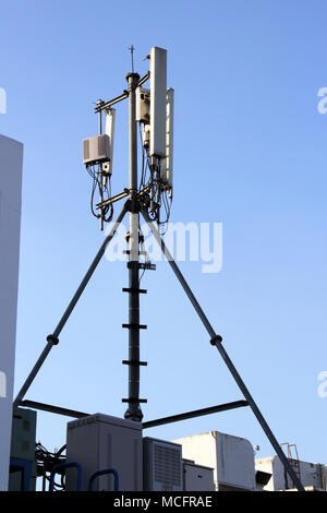 The antenna of the base station of the GSM mobile operator. Telecommunication tower (mast) of ...