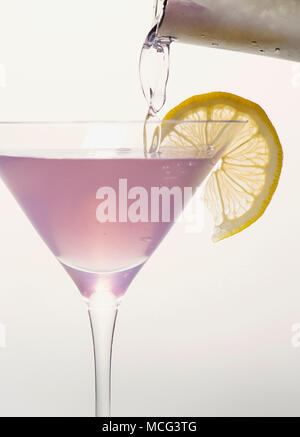 Pouring a shot of vodka Stock Photo - Alamy