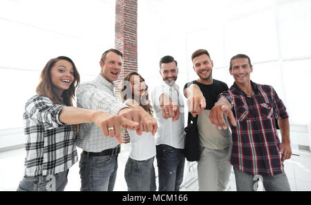 young professionals, pointing his arms forward Stock Photo - Alamy