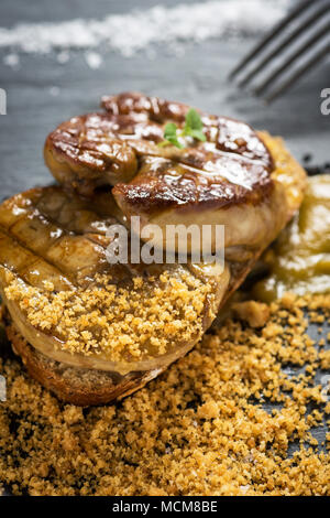 Foie Gras with Mango Puree on Dark Stone Background. French Cuisine ...