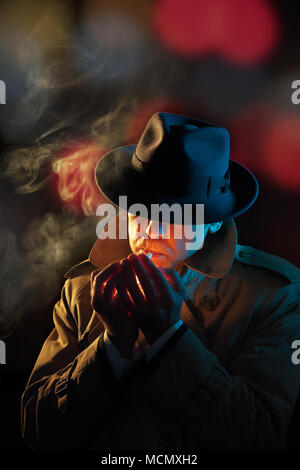 Private detective lighting a cigarette, film noir style Stock Photo - Alamy