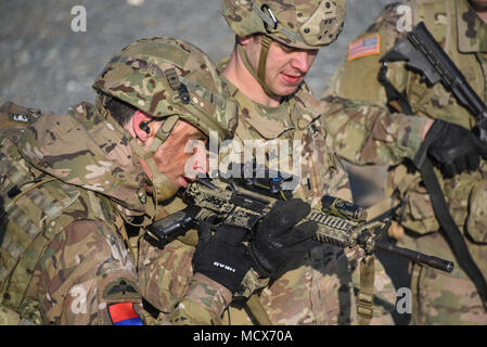 A British Paratrooper, left, of the 7th Parachute Regiment Royal Horse ...