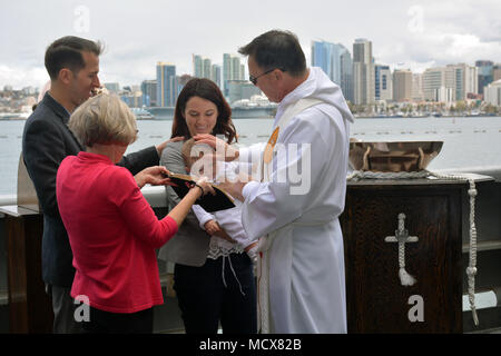 Navy chaplain, Cmdr. Jeffery Plummer, officiates a traditional Navy ...
