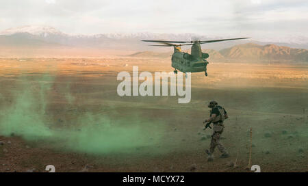 A U.S. Army Task Force Brawler CH-47F Chinook releases flares while ...