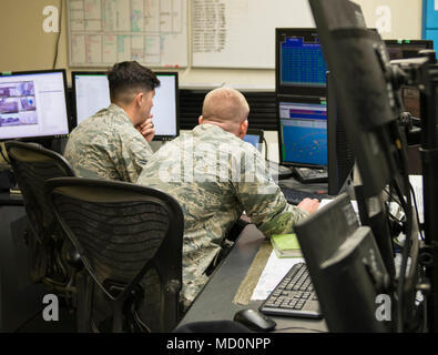 Members from the 18th Wing Security Forces Squadron work as base ...