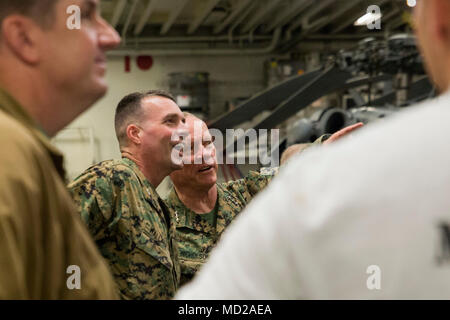 Col. Tye R. Wallace, left, Lt. Gen. Lawrence Nicholson, center, and U.S ...